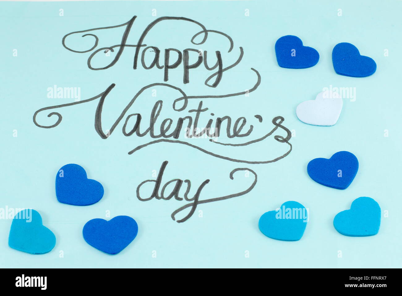 Blue card with a handwritten happy valentine's day inscription Stock ...