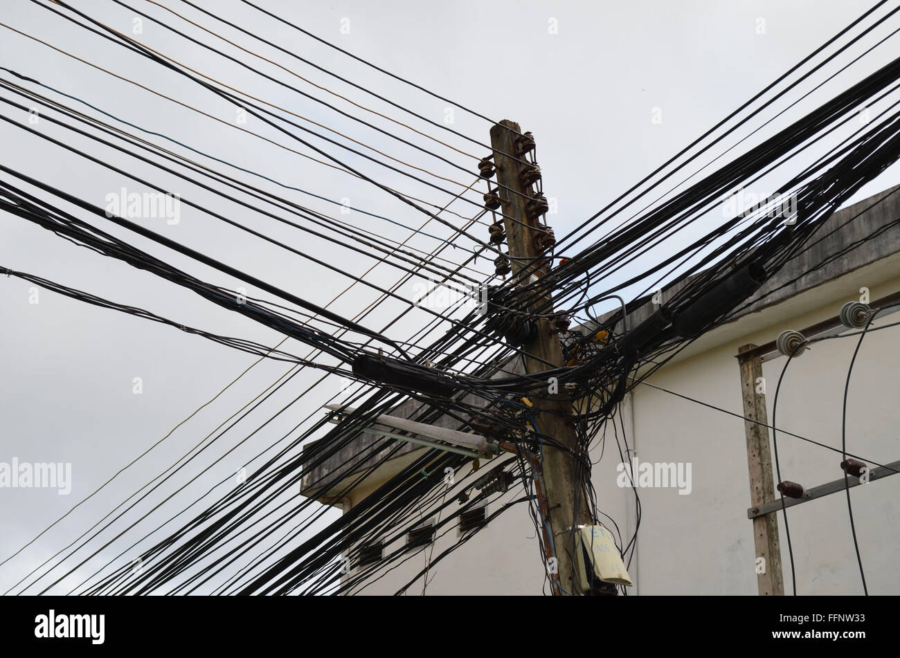 Power lines in Southeast Asia city Stock Photo - Alamy
