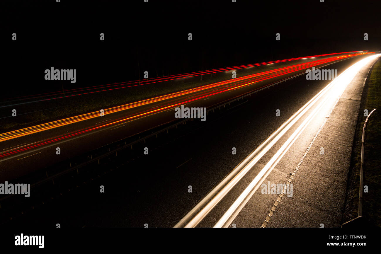 Motorway Traffic lights trails at night Stock Photo - Alamy