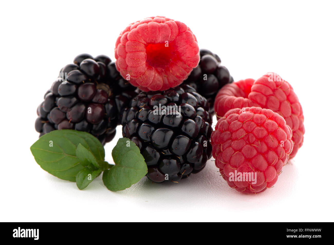 Raspberry with blackberry on white background Stock Photo - Alamy