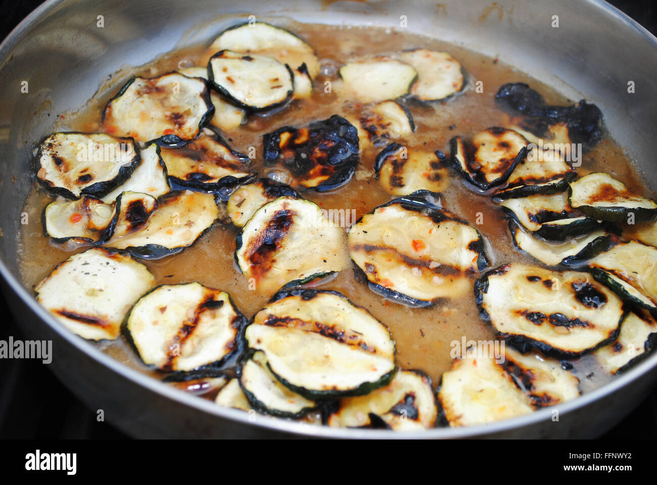 Grilled Zucchini in Italian Dressing in a Pan Stock Photo - Alamy
