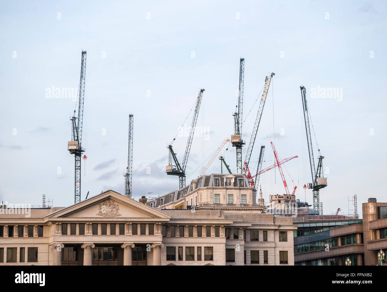 Multiple tower cranes on the Bloomberg Place development site skyline ...