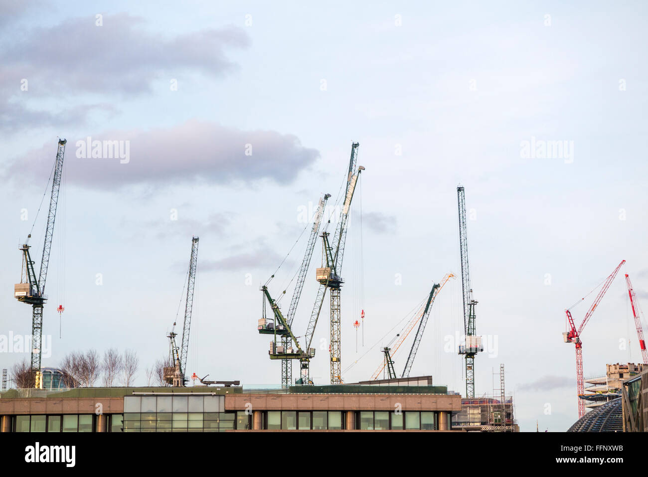 Multiple tower cranes on the Bloomberg Place development site skyline ...