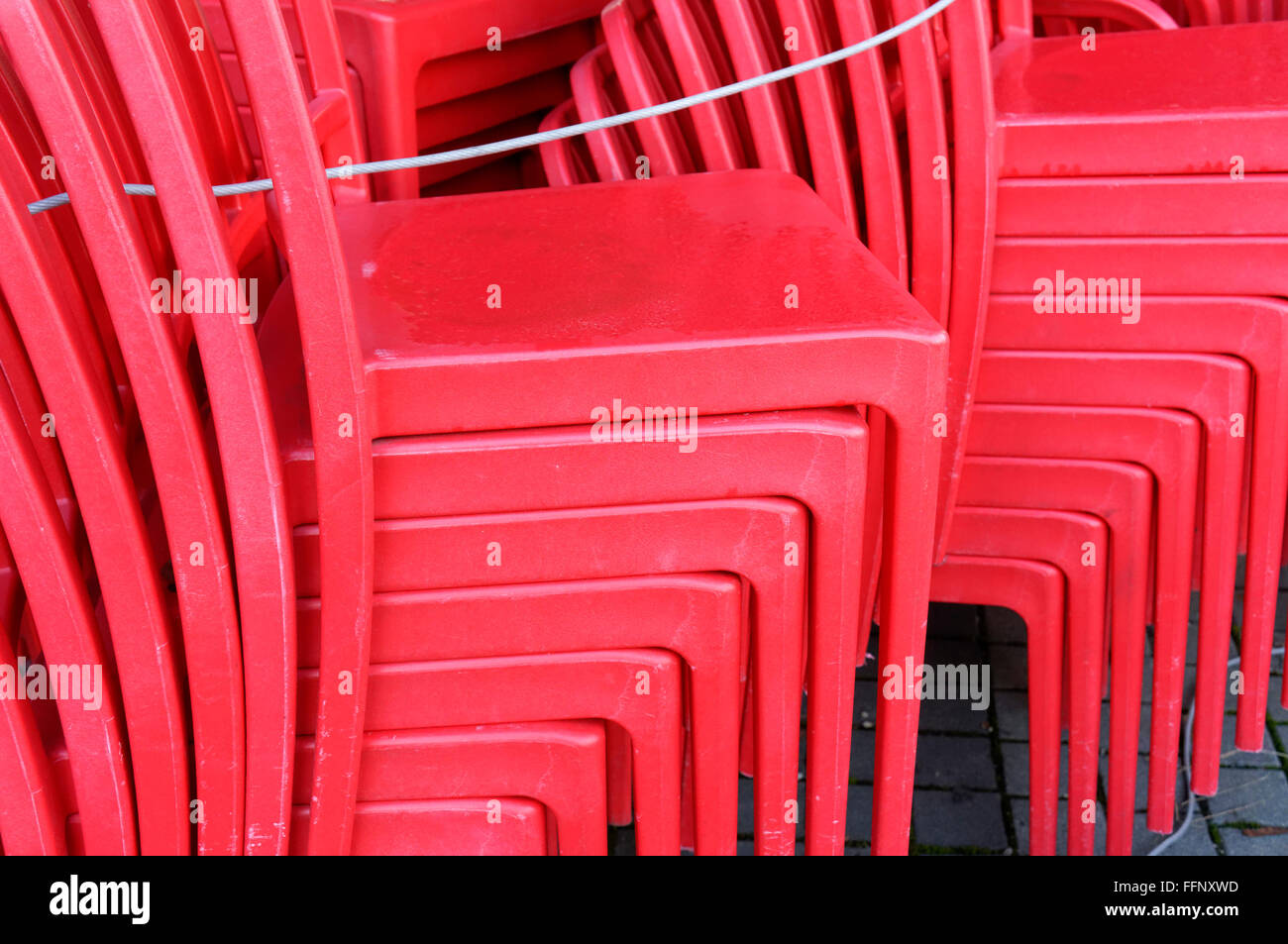 Pile of plastic chairs hi-res stock photography and images - Alamy