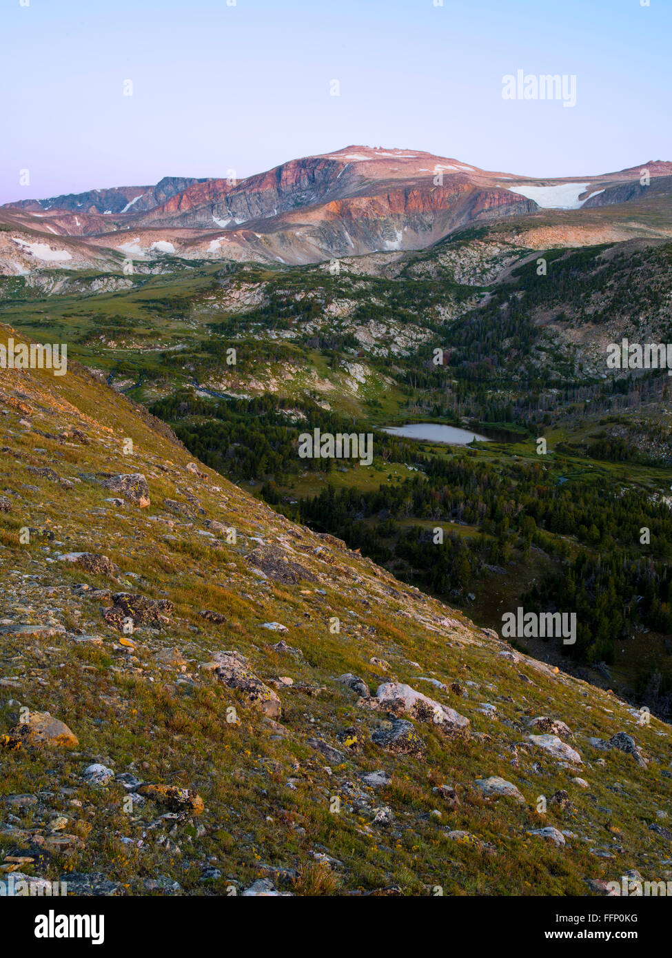 The sun rises on Mount Rearguard in the Absaroka-Beartooth Wilderness ...