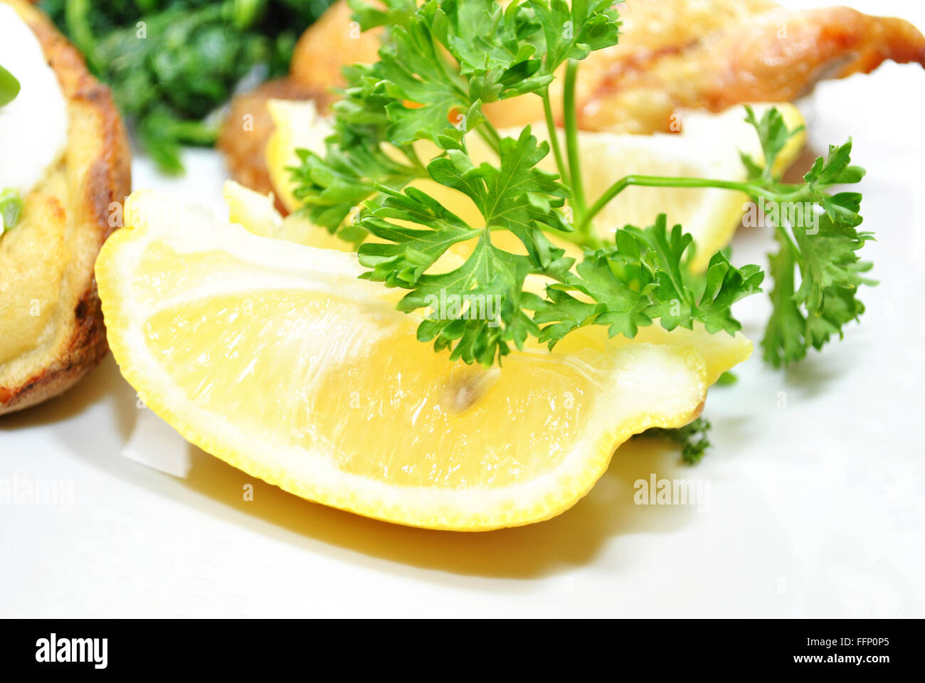 Lemon and Parsley Used a Beautiful Garnish Stock Photo - Alamy