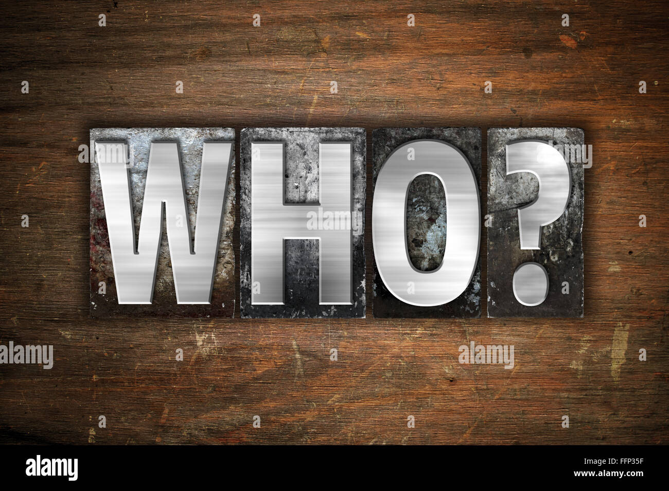 The word "Who" written in vintage metal letterpress type on an aged ...