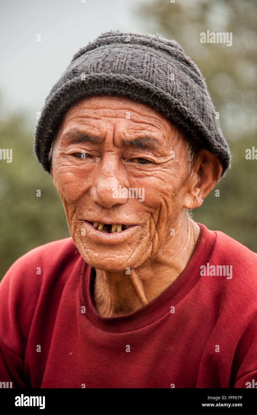 Buddhist old man Stock Photo - Alamy