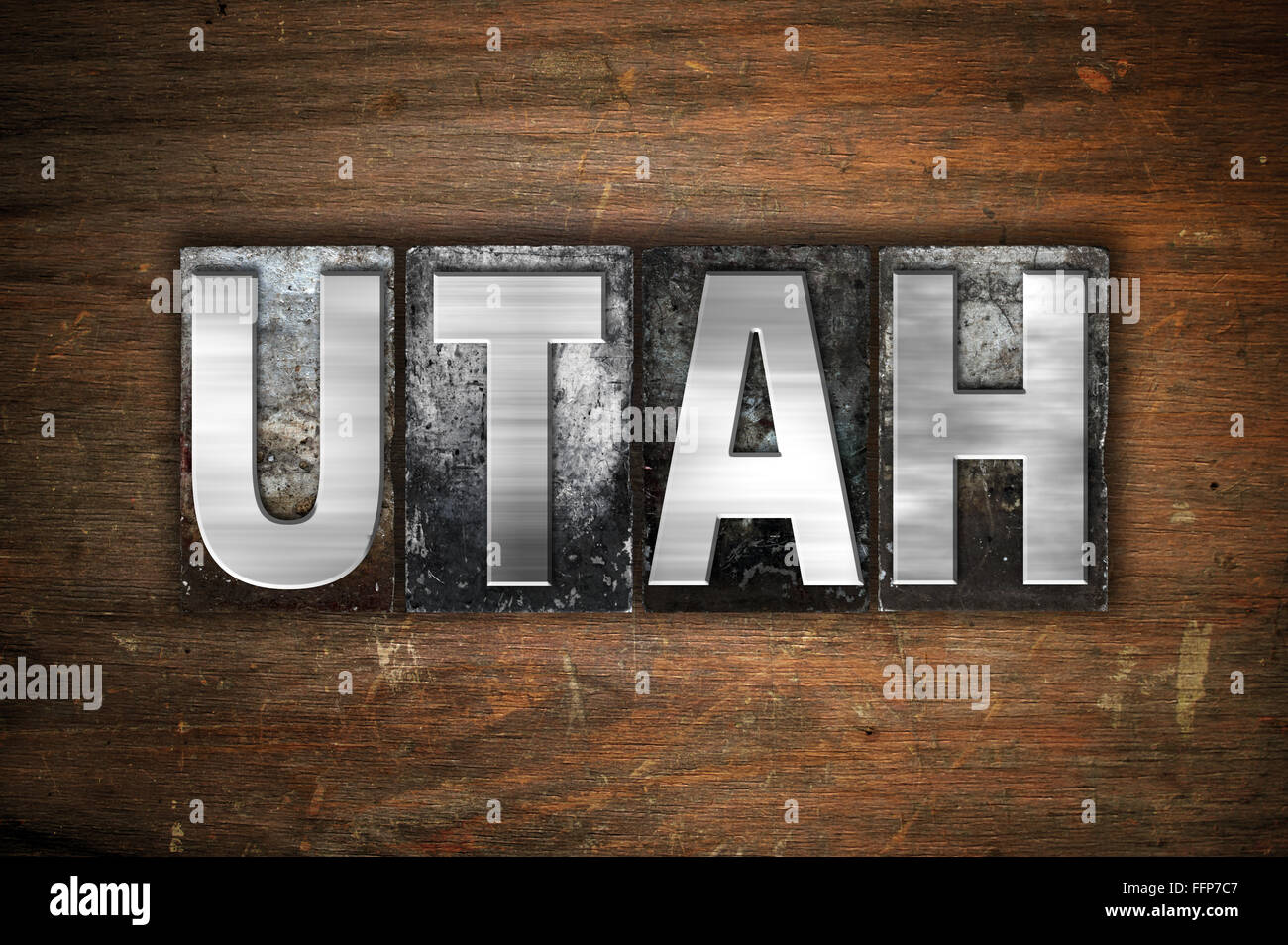 The word "Utah" written in vintage metal letterpress type on an aged ...