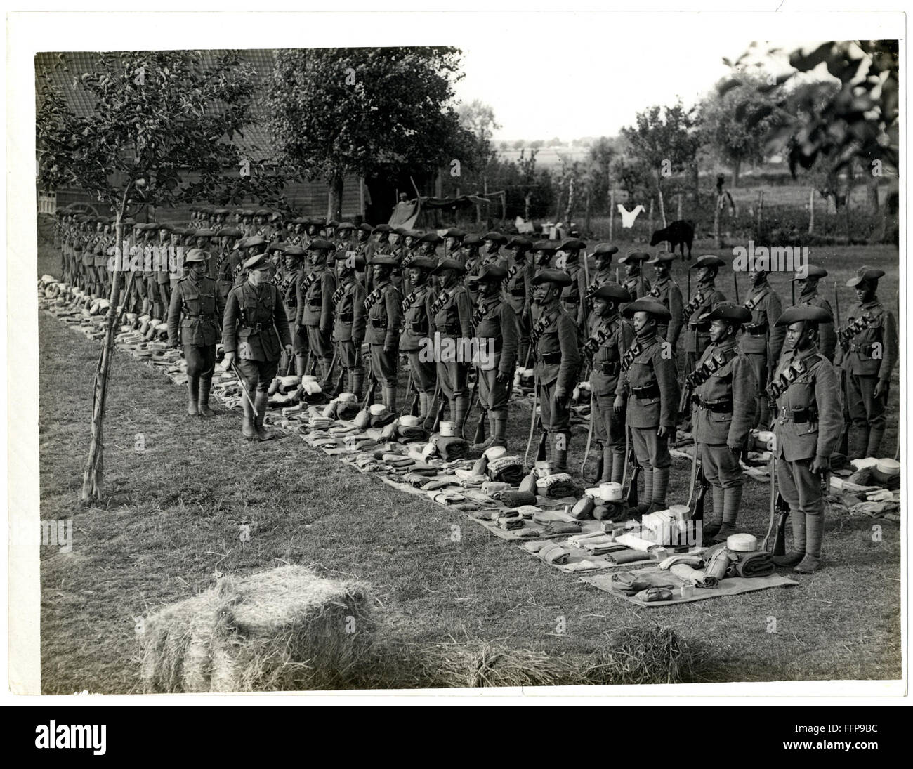 'Inspection in Le Sart, Flanders' is a vintage photographic book by H ...