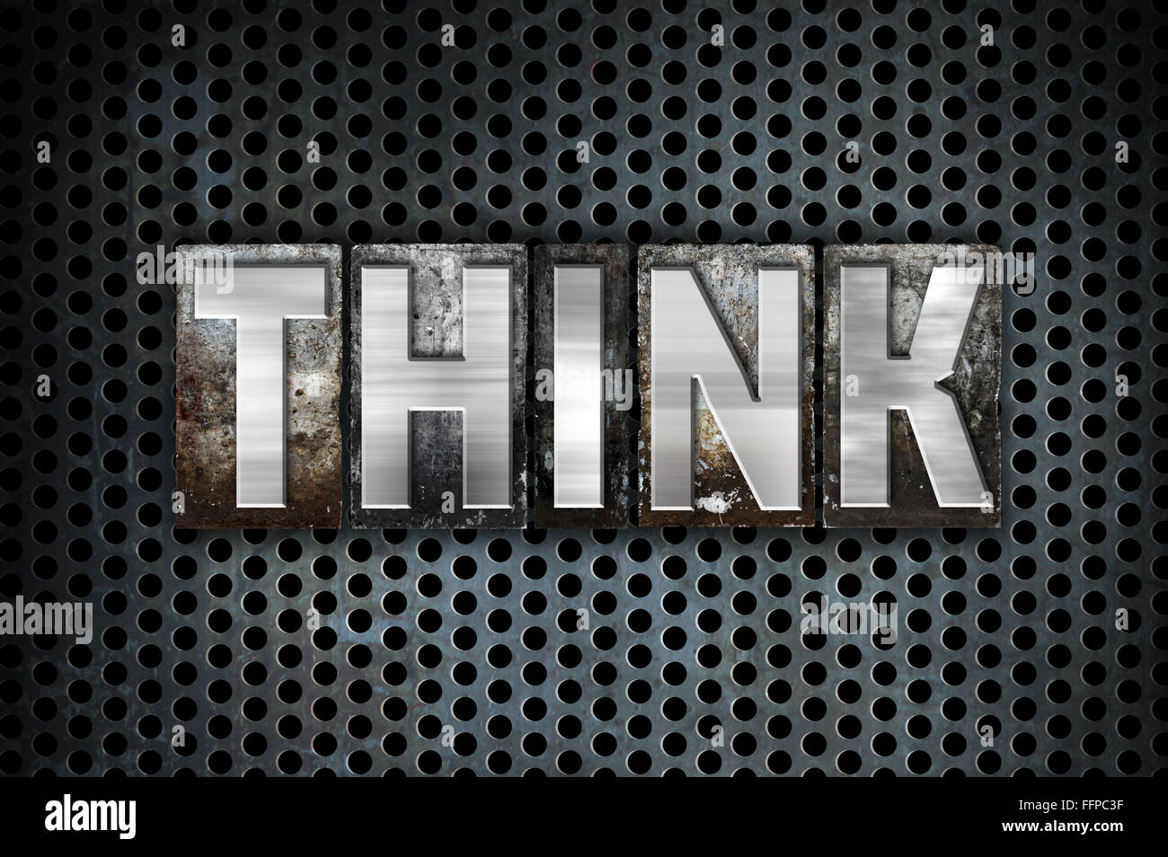 The word "Think" written in vintage metal letterpress type on a black ...