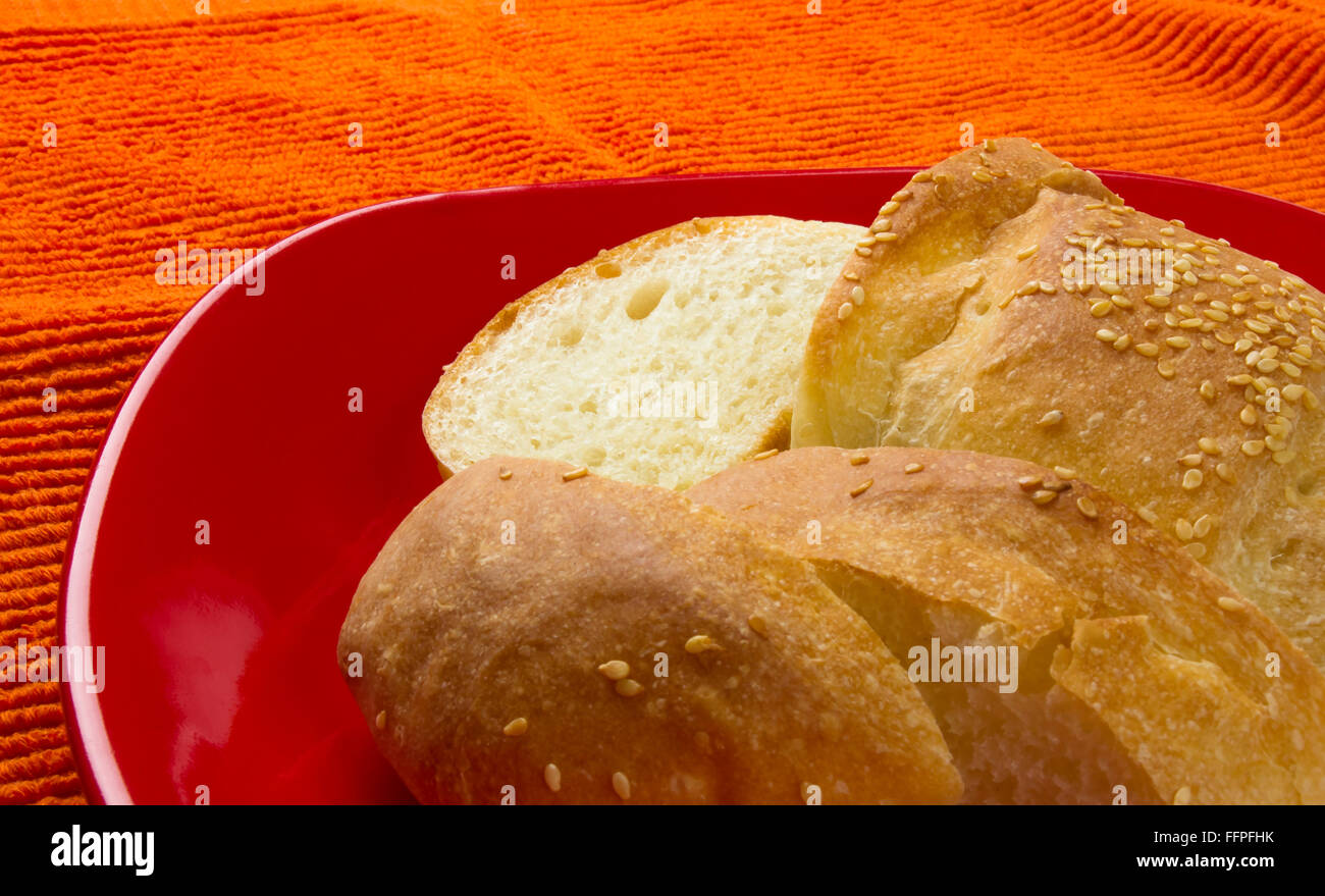 sliced whole wheat breads on a red plate Stock Photo - Alamy