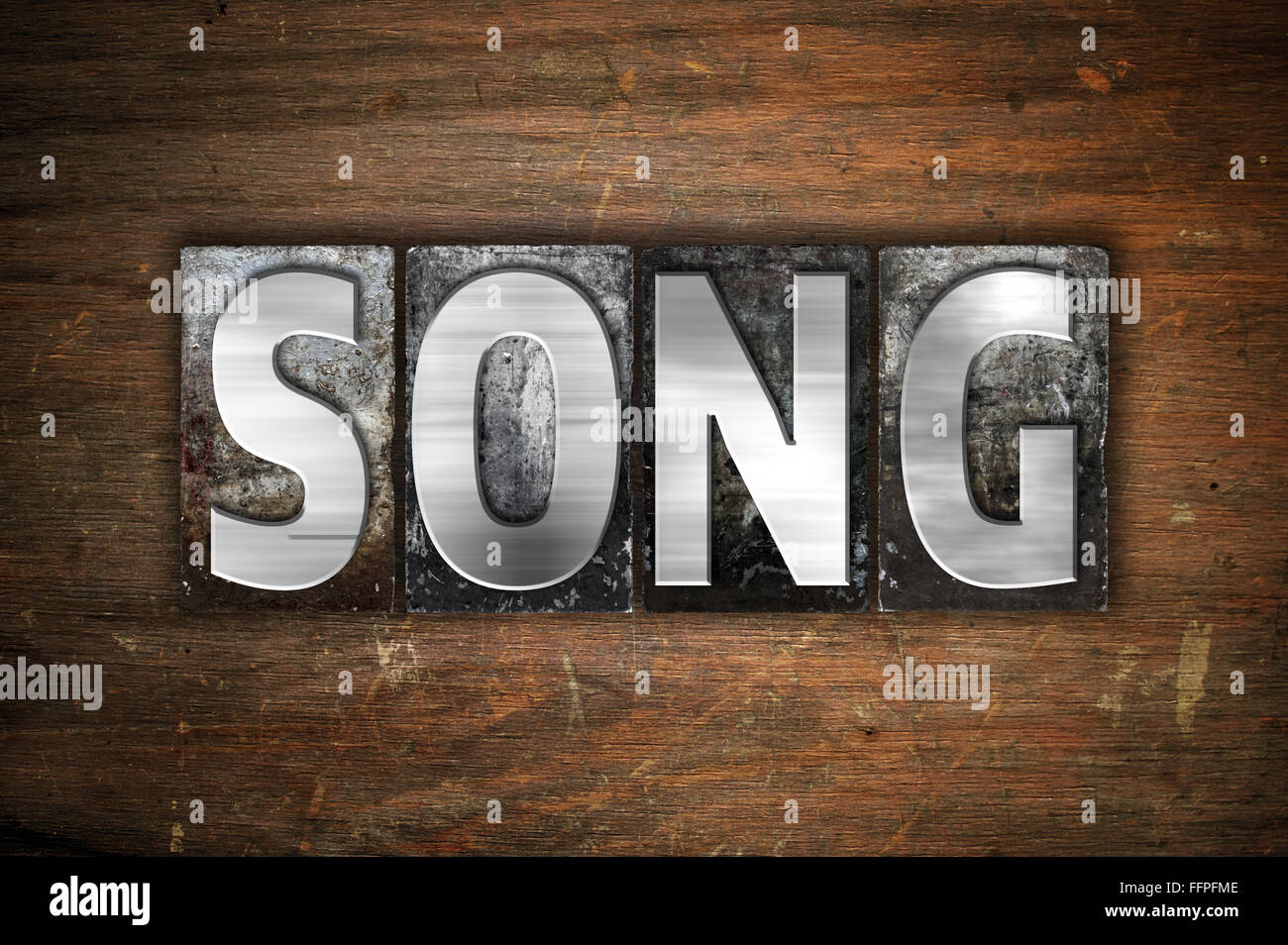 The word "Song" written in vintage metal letterpress type on an aged ...