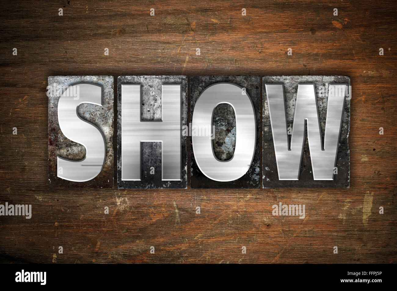 The word "Show" written in vintage metal letterpress type on an aged ...