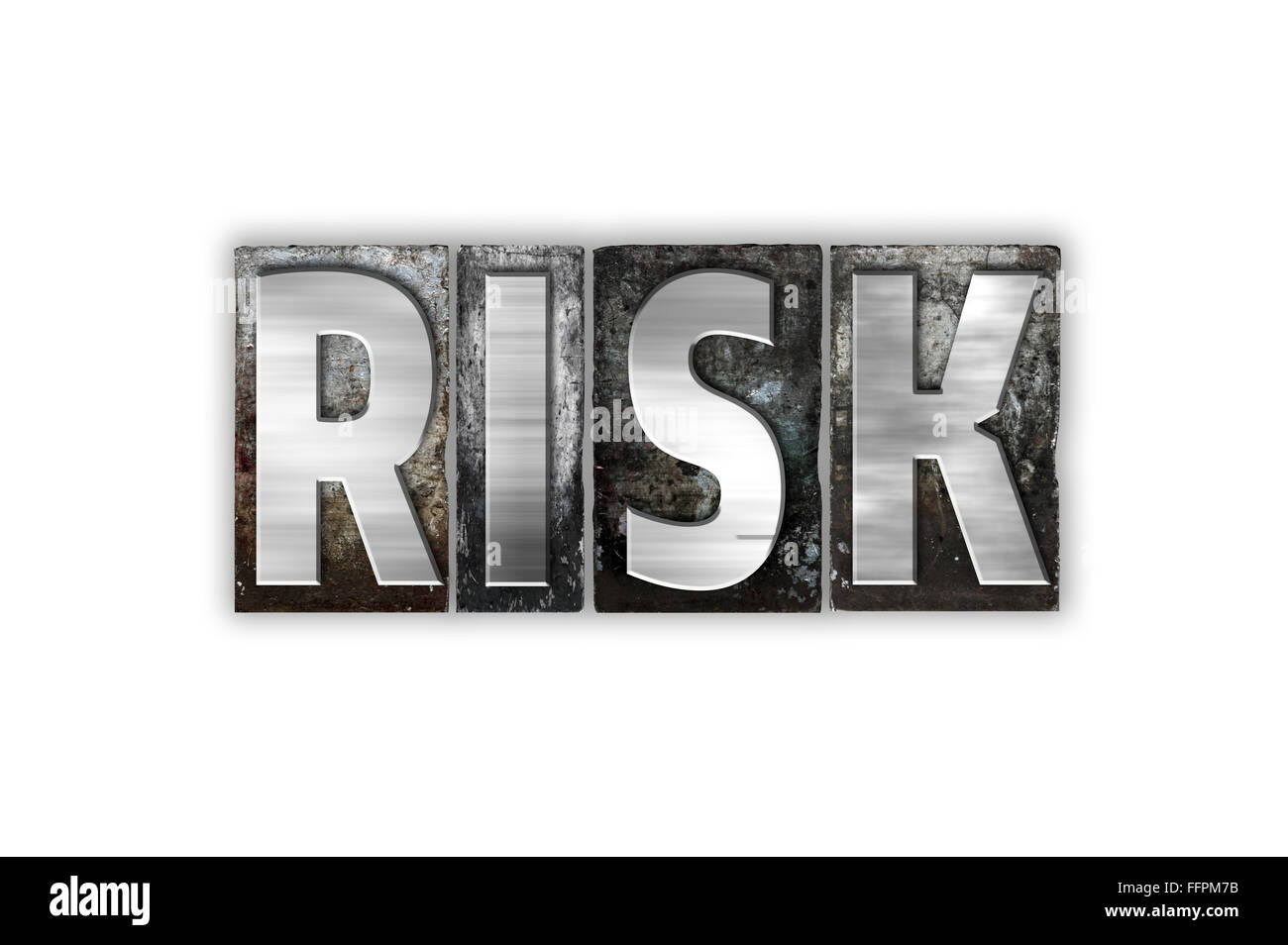 The word "Risk" written in vintage metal letterpress type isolated on a ...