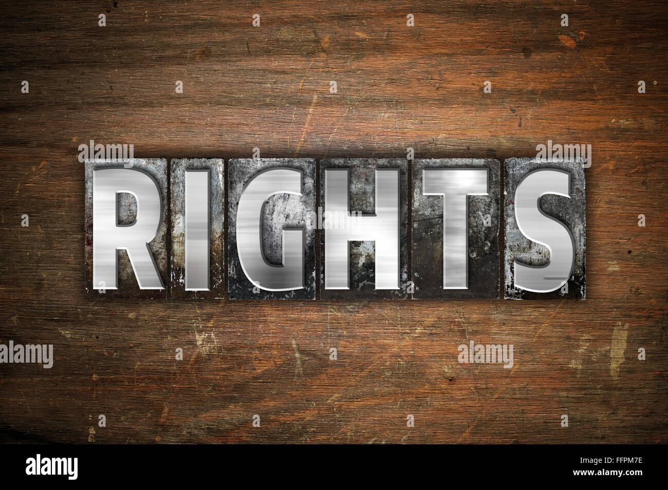 The word "Rights" written in vintage metal letterpress type on an aged ...