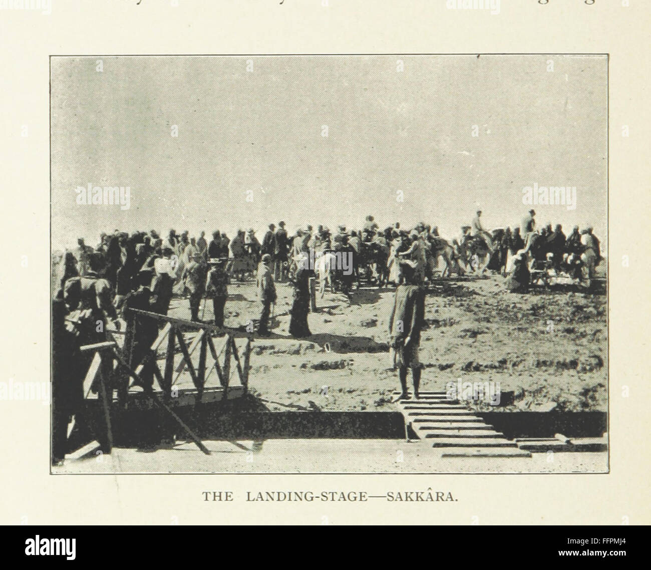This vintage book, 'On the Nile with a Camera', features a photographic ...