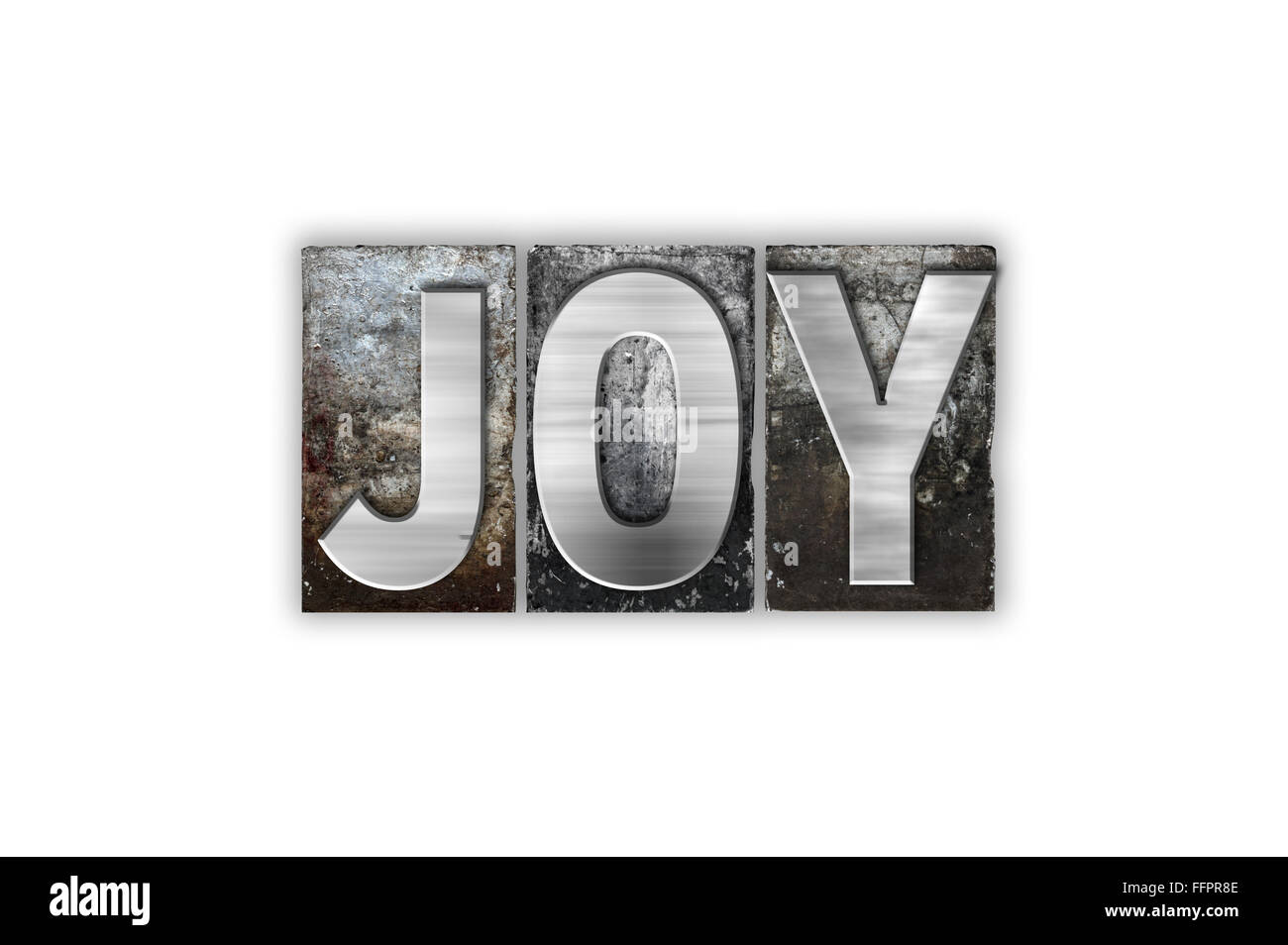 The word "Joy" written in vintage metal letterpress type isolated on a ...