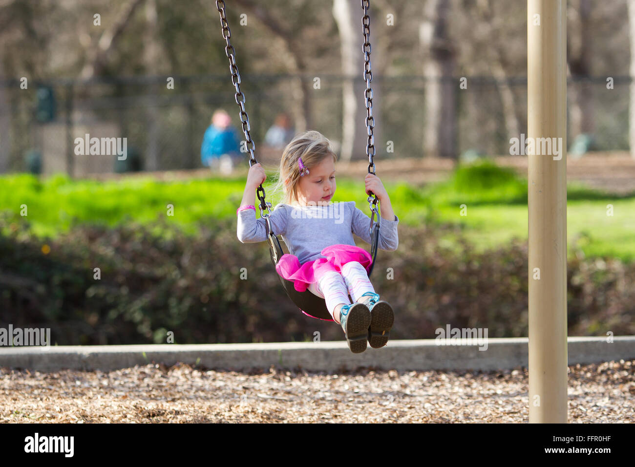 Swinging day park hi-res stock photography and images - Alamy