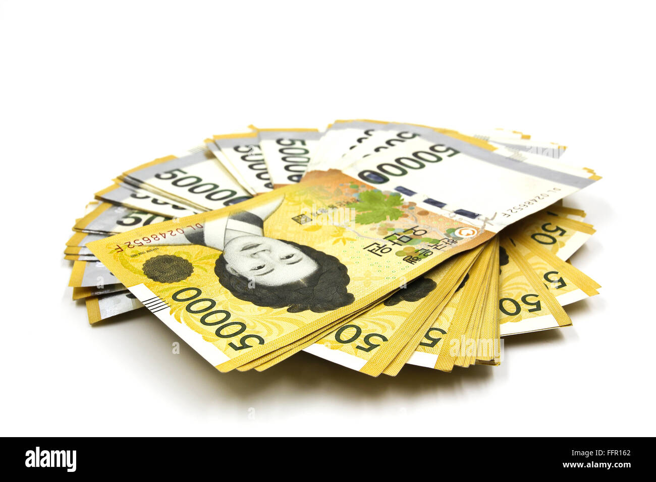 Korean Won currency bills isolated on white background Stock Photo - Alamy