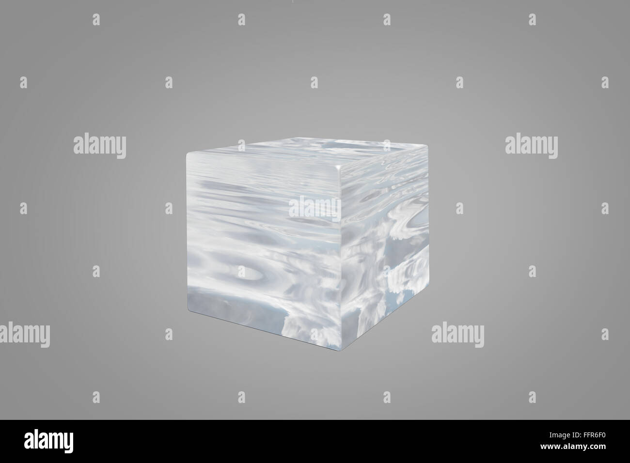 Frost ice cube on the gray background Stock Photo - Alamy