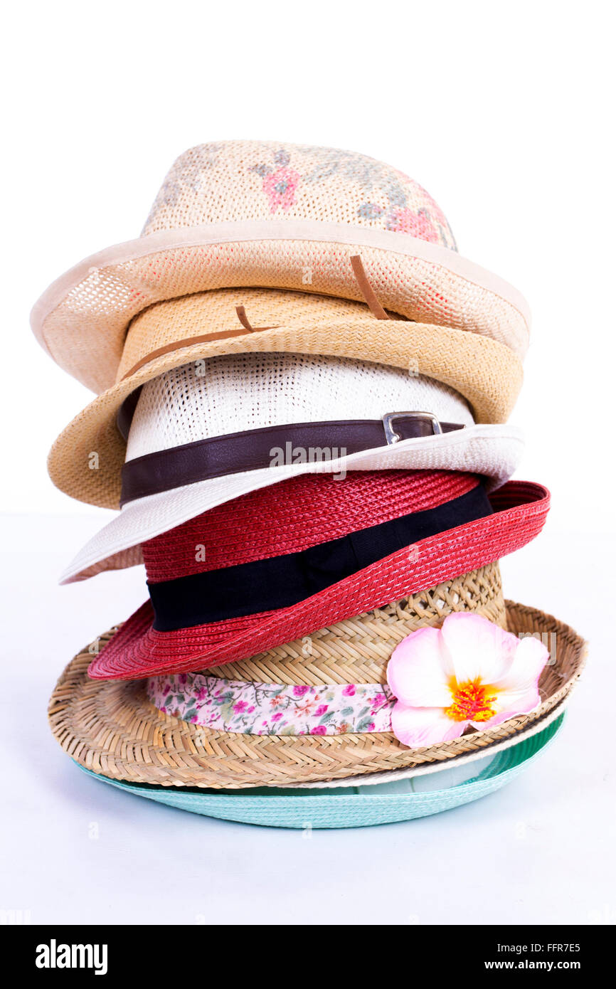 group hats placed one above another in a column Stock Photo - Alamy