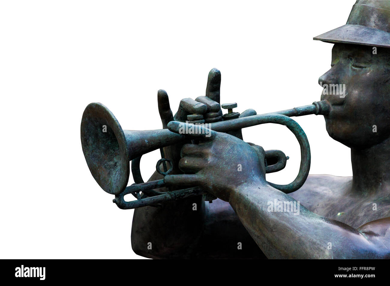 the statue of man sitting and blowing trumpets Stock Photo - Alamy
