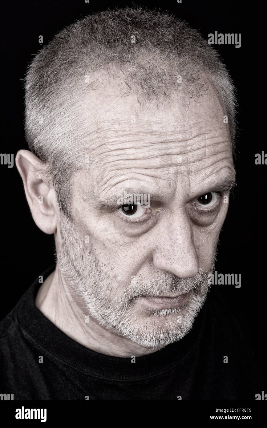 Portrait of a serious adult man with an inquisitive look Stock Photo ...
