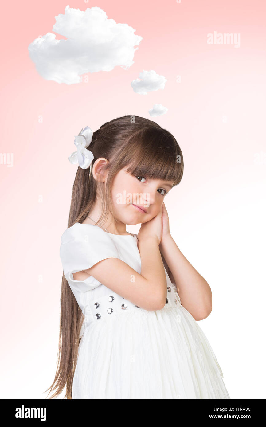 Beautiful smiling girl dreaming on the pink background Stock Photo - Alamy