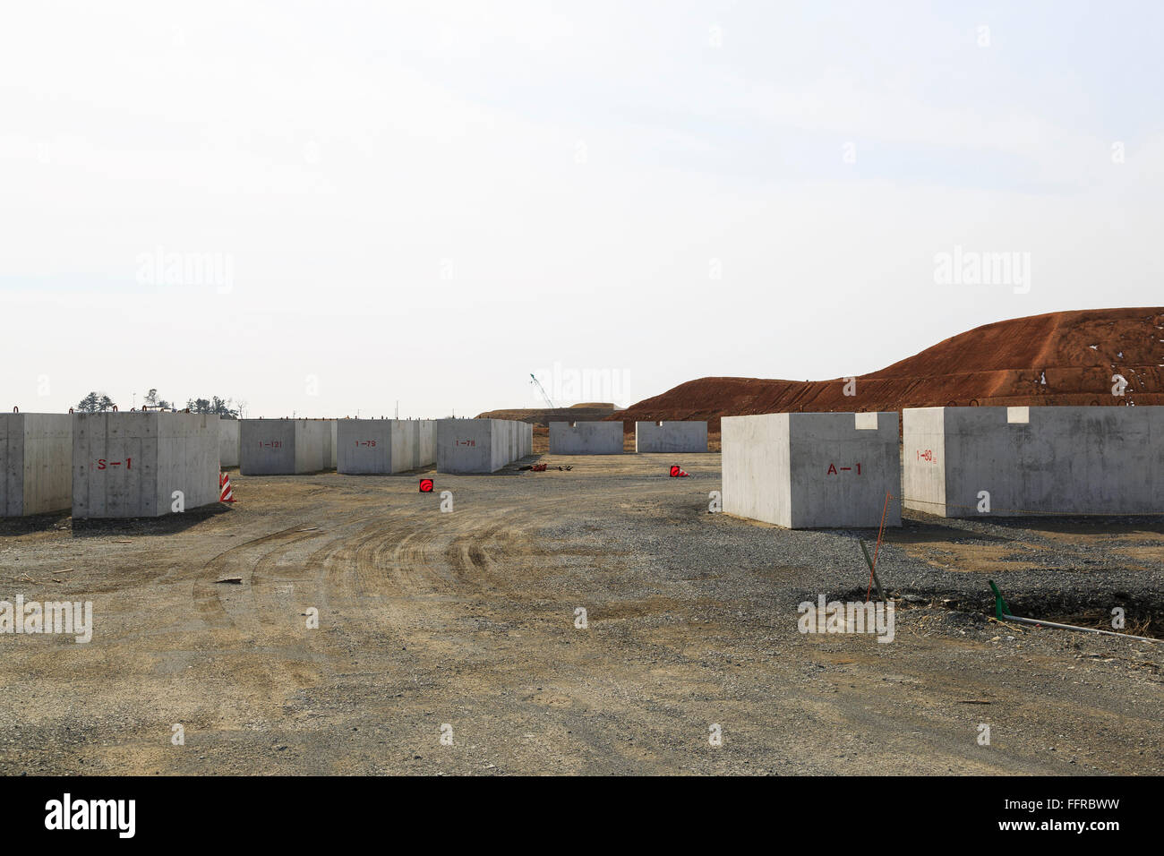 Construction blocks in front of the abandoned Kesennuma Koyo High ...