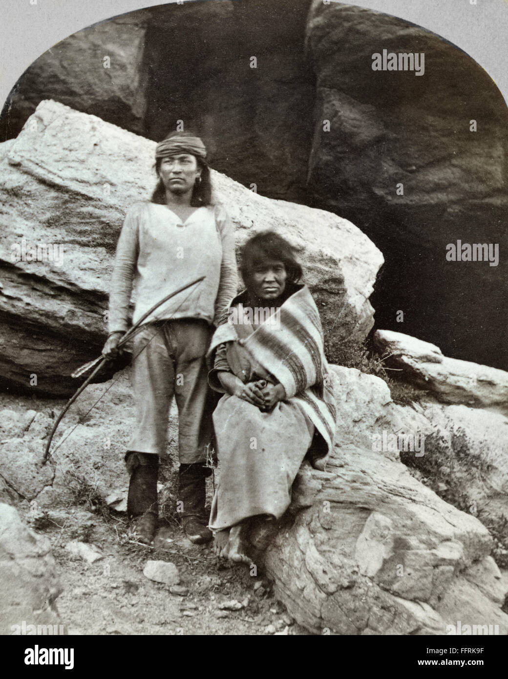 NAVAJOS, 1873./nYoung Navajo man and his mother. Photographed by ...