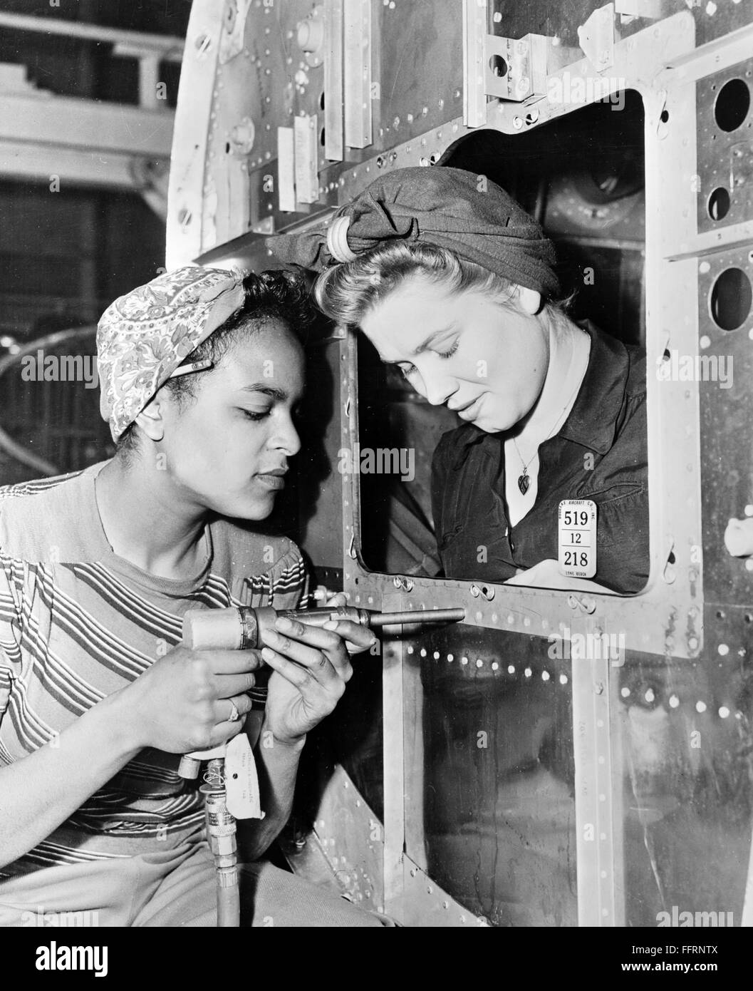 DOUGLAS AIRCRAFT FACTORY. /nTwo women at work at the Douglas Aircraft ...