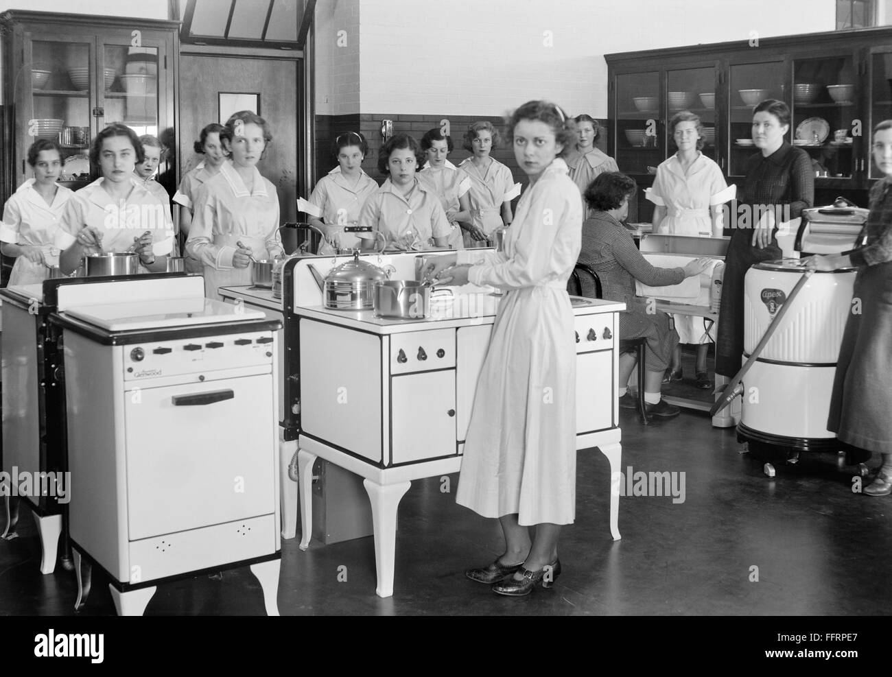 HIGH SCHOOL COOKING, 1935. /nCooking class at Chevy Chase High School ...