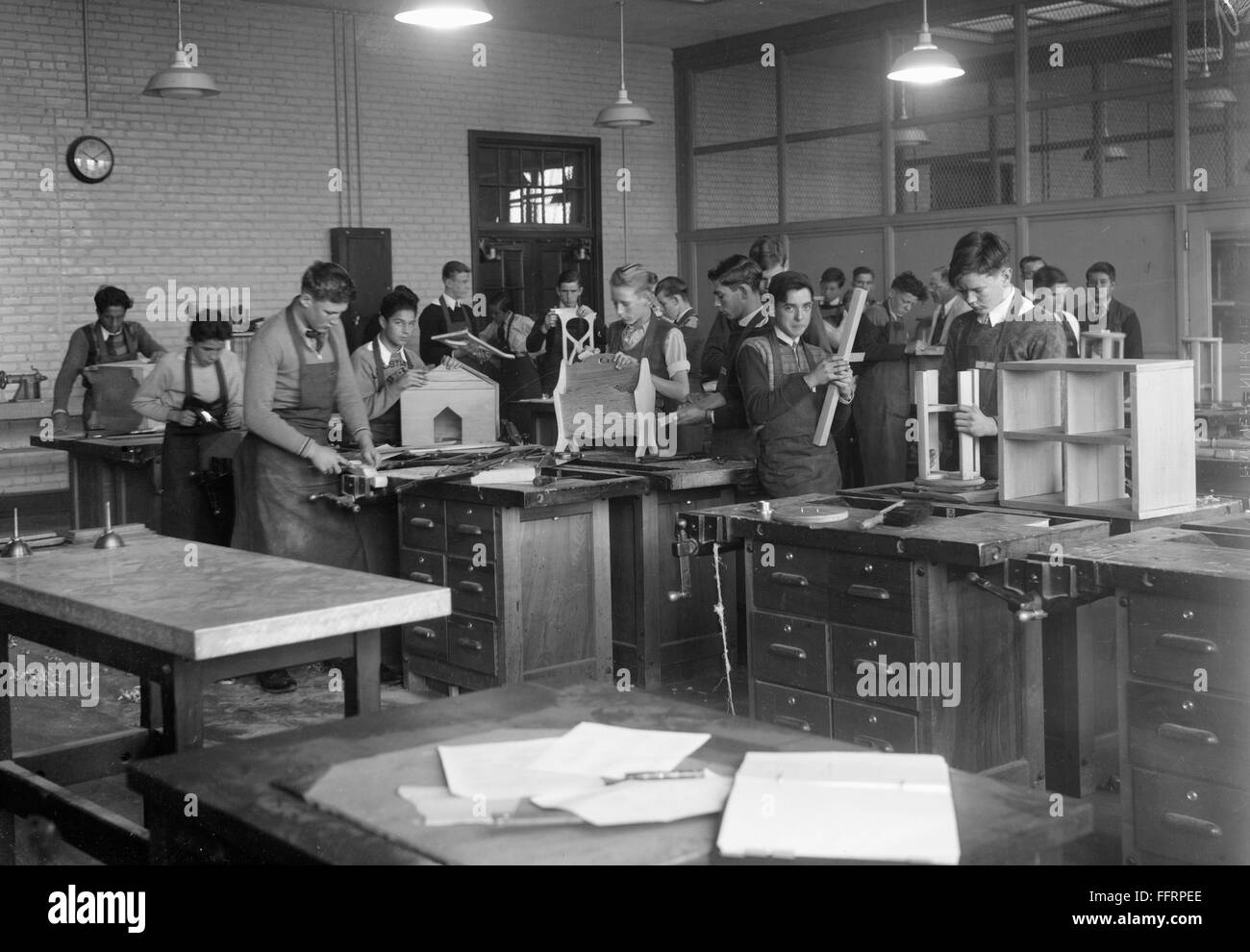 HIGH SCHOOL CLASS, 1939. /nStudents at work in a carpentry shop class ...
