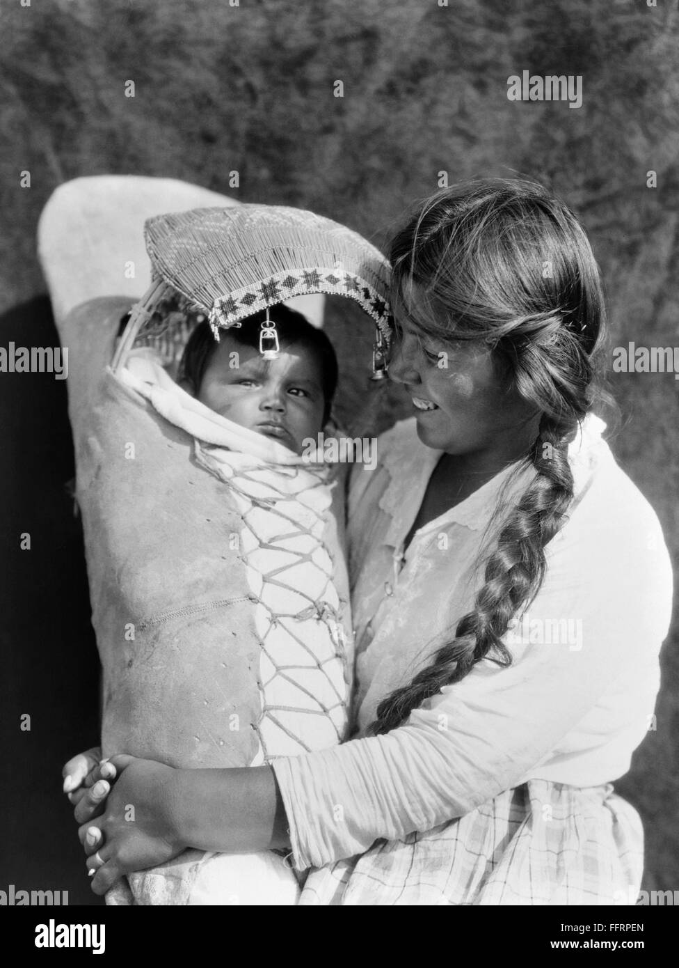 ACHOMAWI MOTHER, c1923. /nAn Achomawi mother with her child in a ...