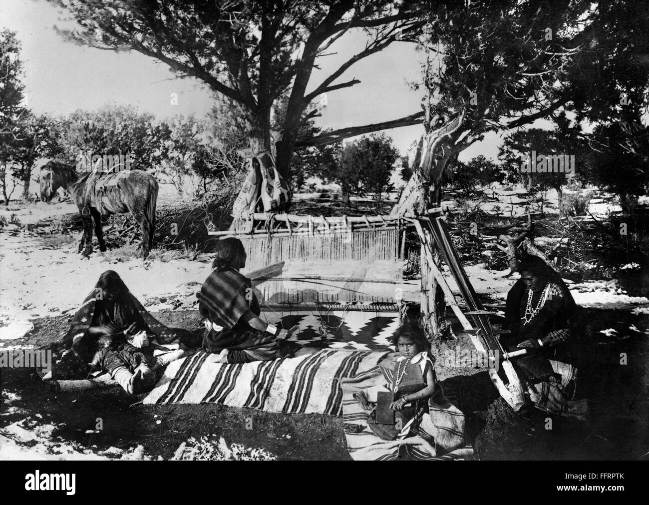 NAVAJO WEAVERS, 1893. /nCharlie, a Navajo man, weaving a blanket on a ...