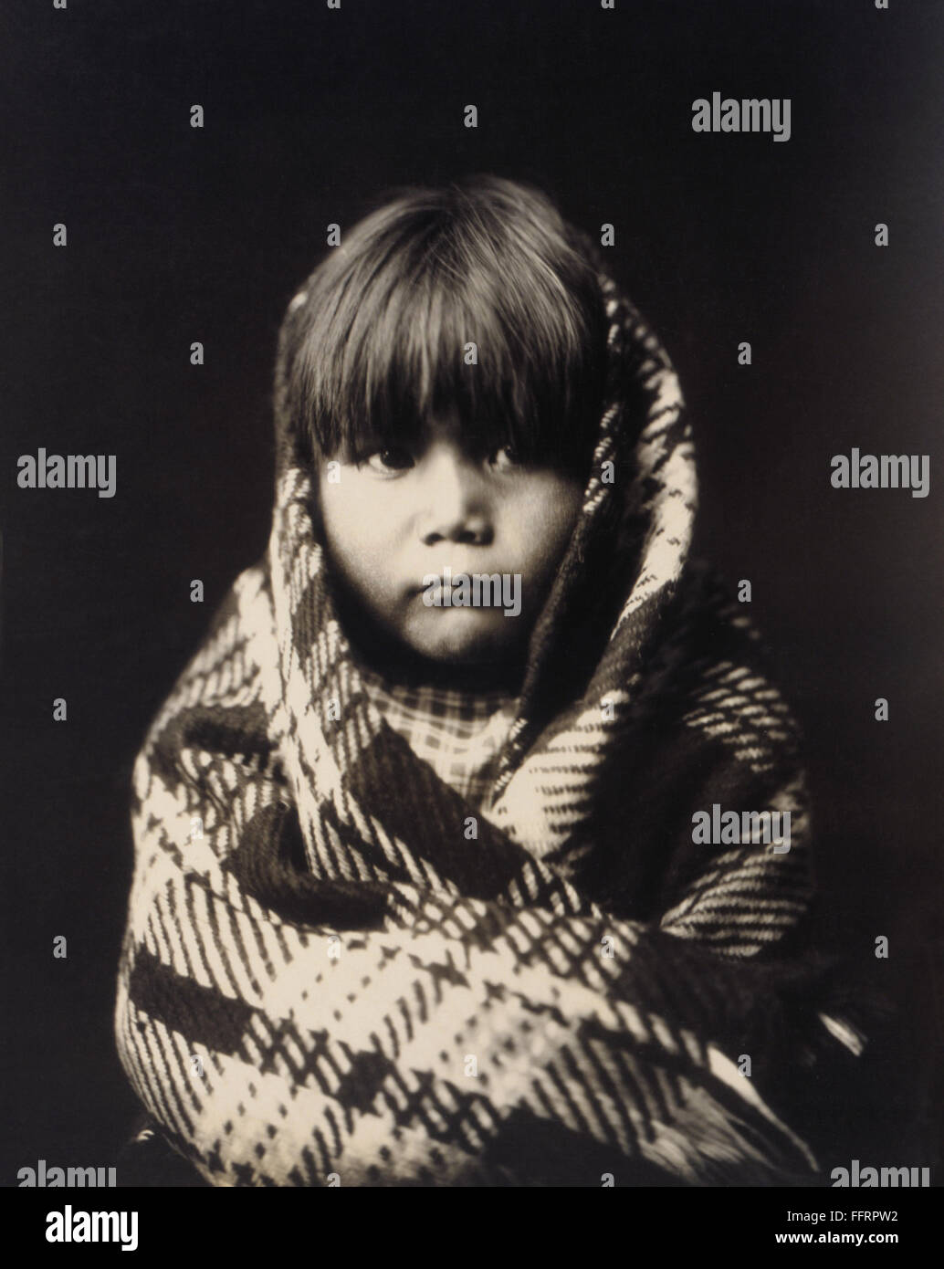 NAVAJO CHILD, c1904. /nA Navajo child wrapped in a blanket. Photograph ...