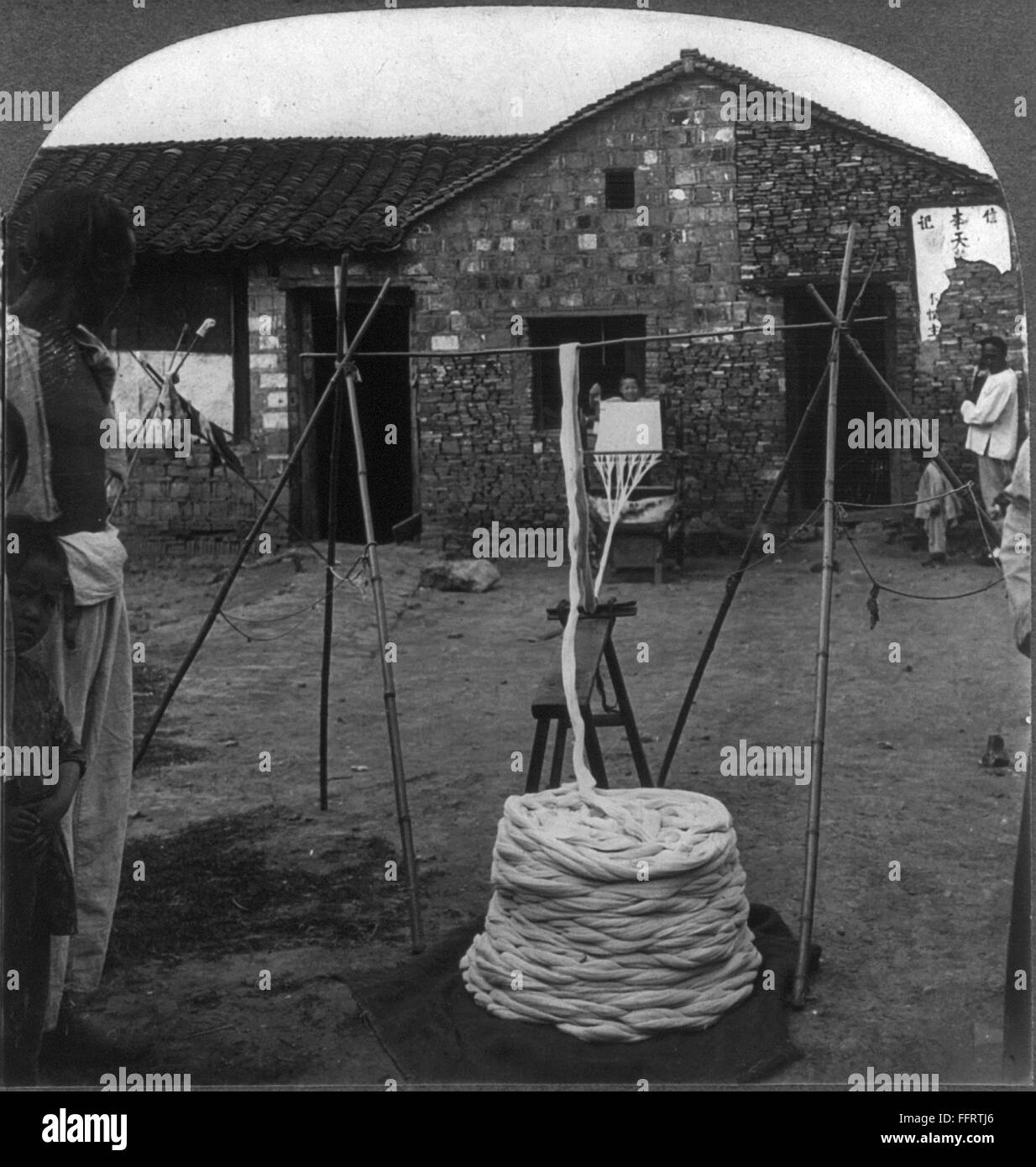CHINA: CLOTH-MAKING, c1906. /nThe process of separating the threads of ...