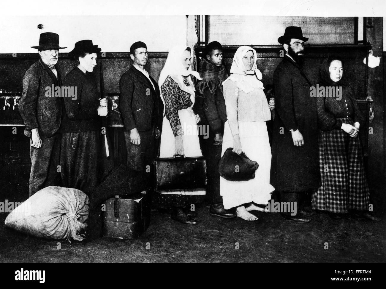 ELLIS ISLAND: IMMIGRANTS. /nGroup of newly arrived immigrants at Ellis ...
