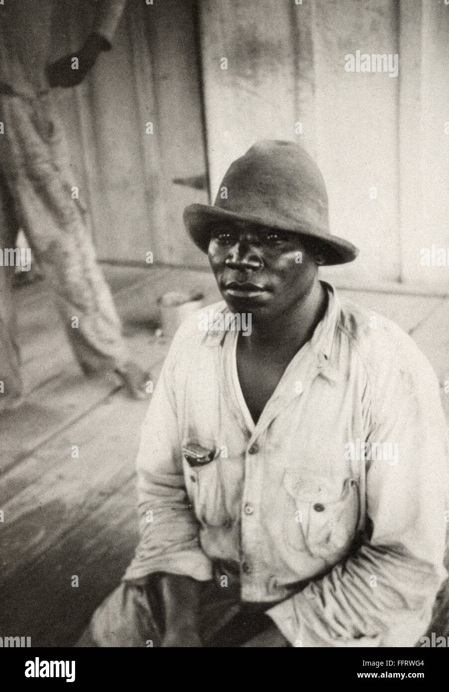 SUGAR MILL WORKER, 1934. /nAfrican American sugar mill worker at at ...