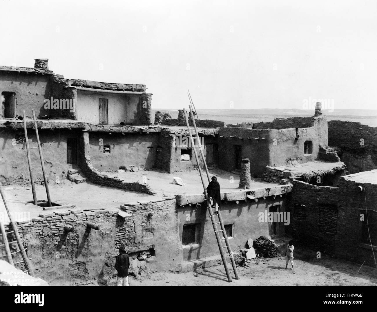 NEW MEXICO: ZUNI PUEBLO. /nZuni Native Americans in a pueblo village in ...