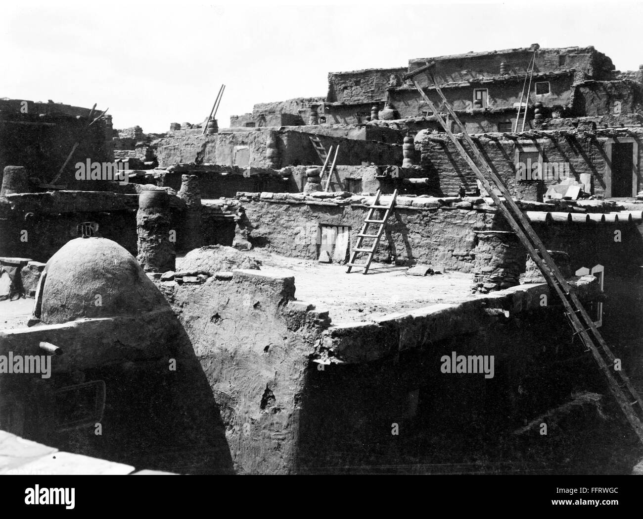 NEW MEXICO: ZUNI PUEBLO. /nAdobe buildings in a Zuni pueblo village in ...