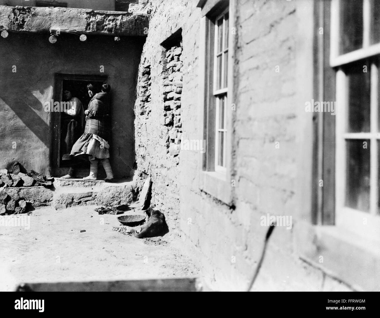 ZUNI PUEBLO, c1903. /nZuni Native Americans in a doorway in a pueblo ...