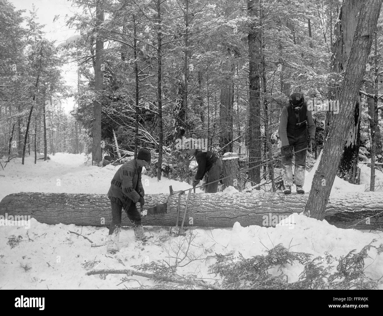 MICHIGAN: LUMBERJACKS. /nCutting lumber during the winter in Michigan ...