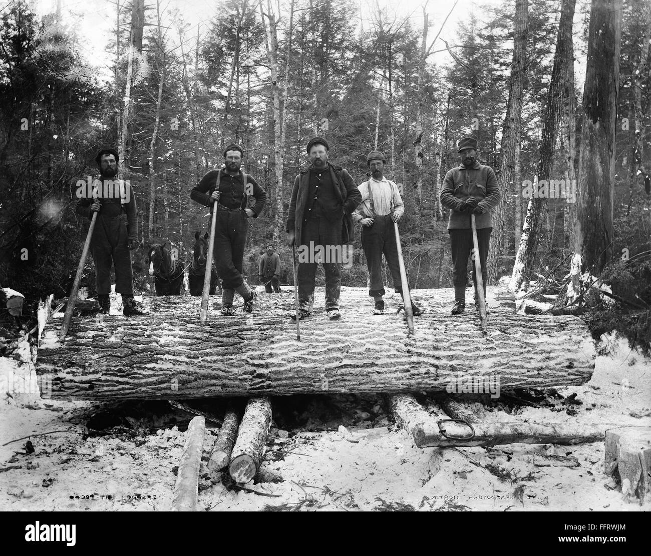 MICHIGAN: LUMBERJACKS. /nA group of lumberjacks standing on a snow ...