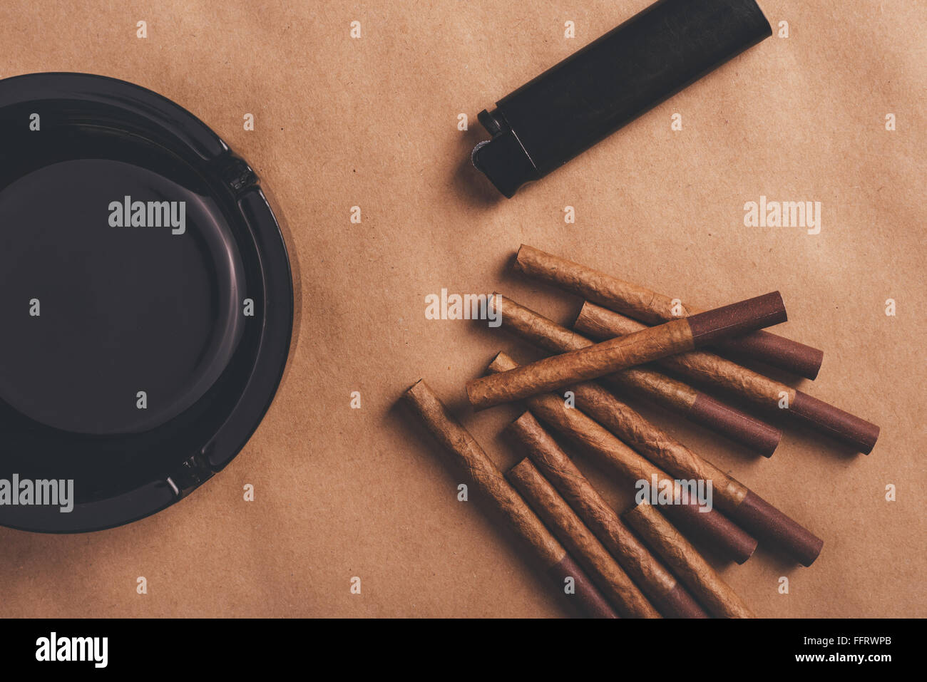 Passionate smoker flat lay table top view arrangement, warm retro toned ...