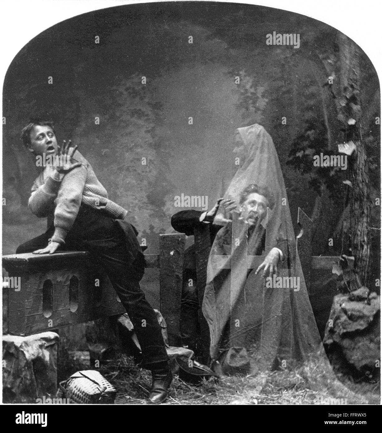 GHOST, c1889. /nA posed studio scene of a ghost scaring a man and boy ...