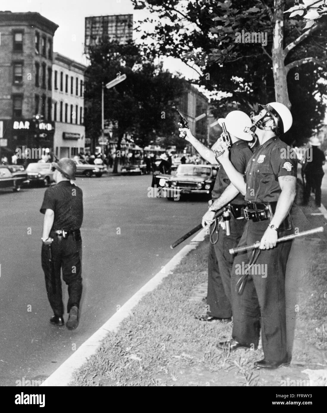HARLEM: RIOTS, 1964. /nPolice in Harlem standing on the street with ...