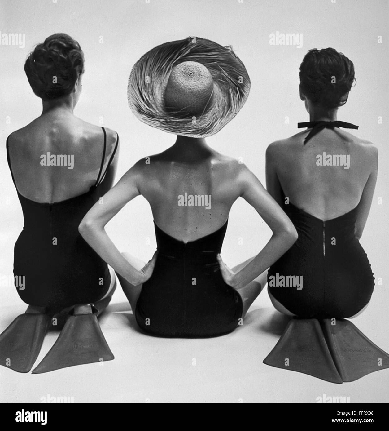 FASHION: SWIMSUITS, 1950. /nBack view of fashion models in swimsuits ...