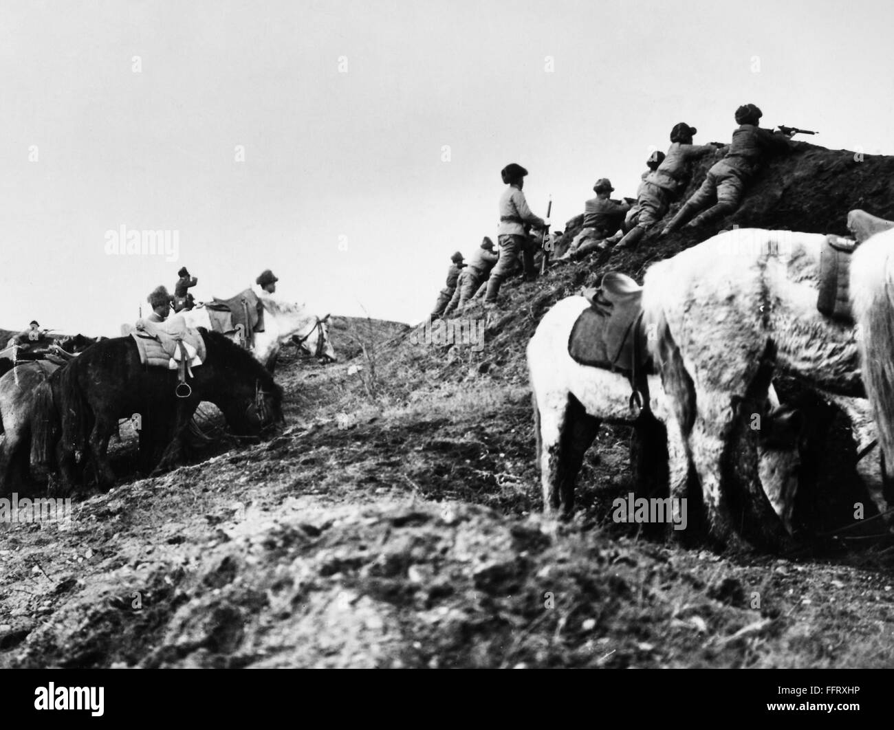 MANCHURIA, AUGUST 1945. /nJapanese cavalry troops on maneuvers along ...